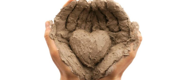 forming a clay heart - Crossroads Initiative