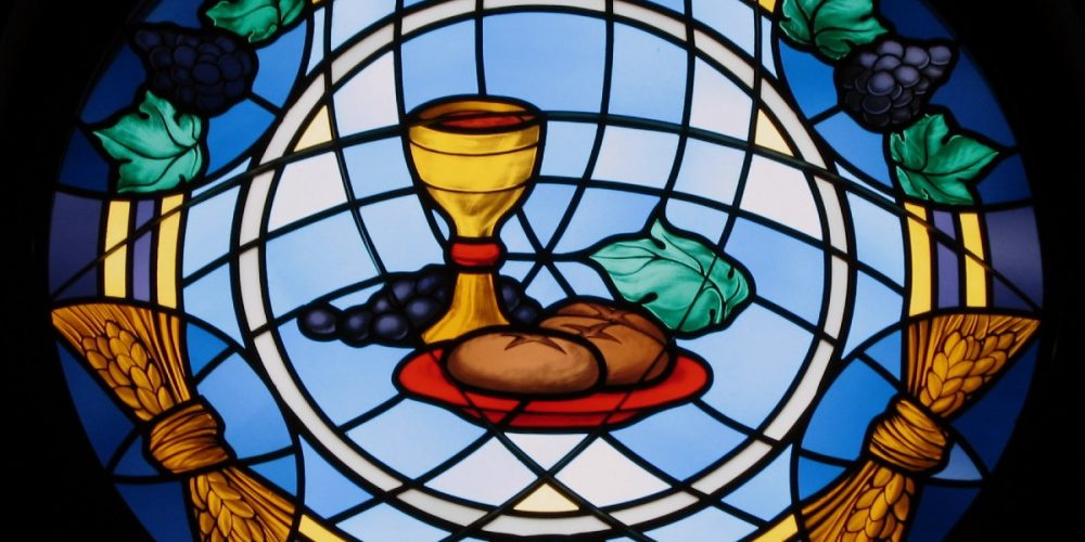 aquinasstained glass chalice wine bread - Crossroads Initiative
