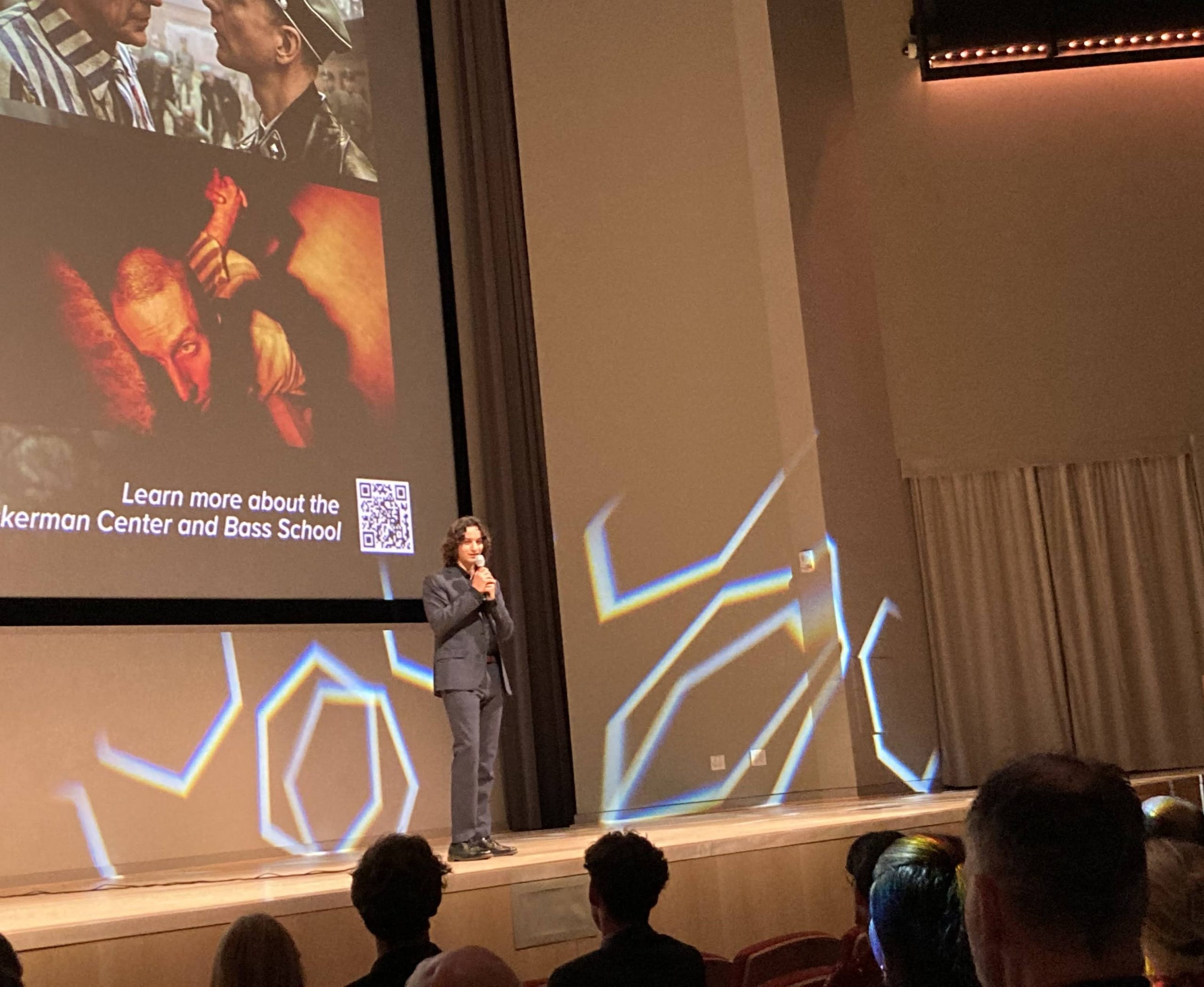 TOTH prem Iskandar on stage - Crossroads Initiative